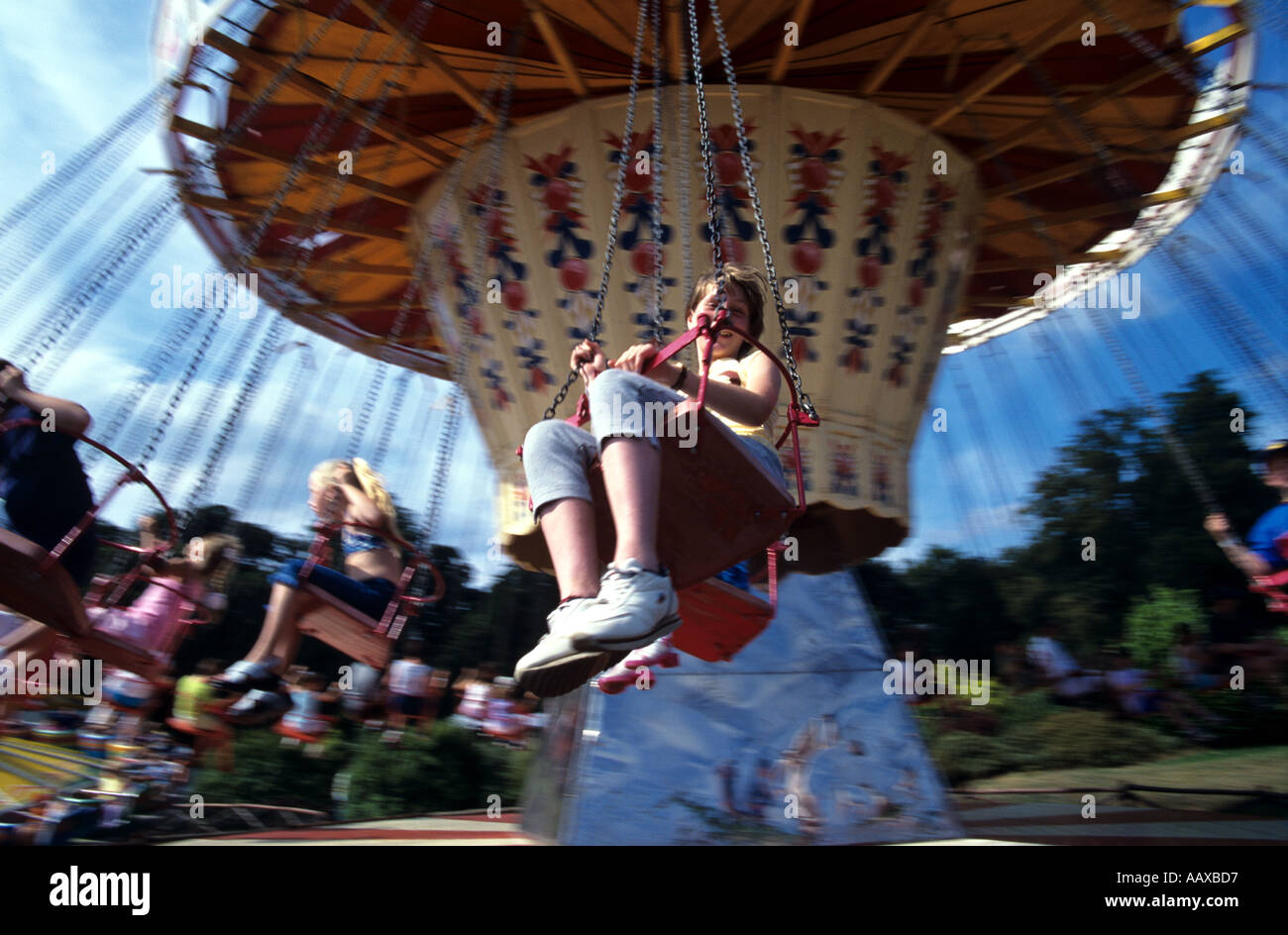 Young girl on Fun Fair ride Stock Photo - Alamy