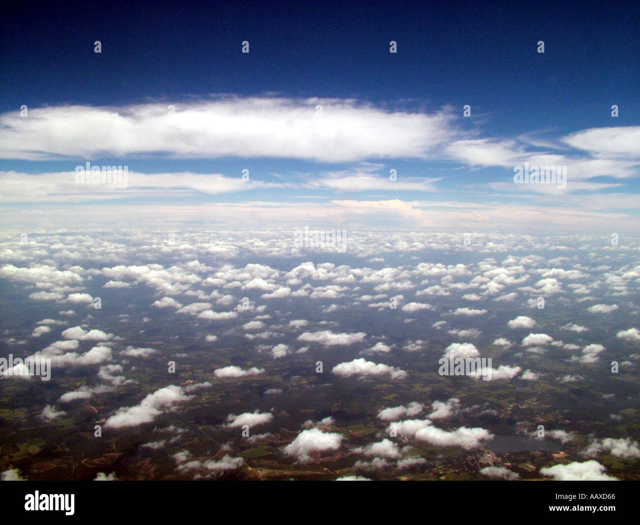 Blue sky clouds and earth Stock Photo - Alamy