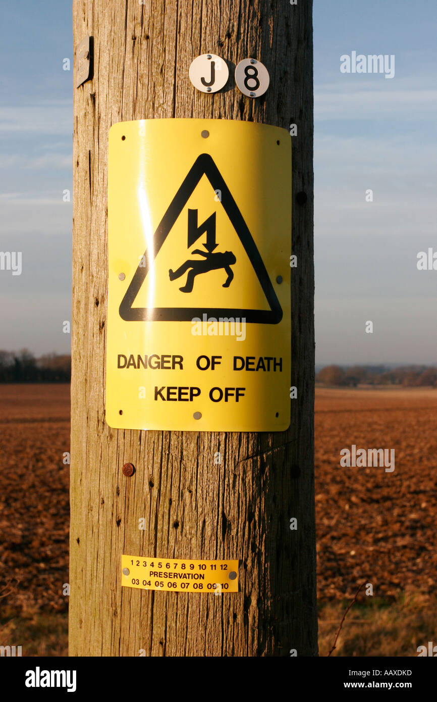 Electric pole danger sign hi-res stock photography and images - Alamy