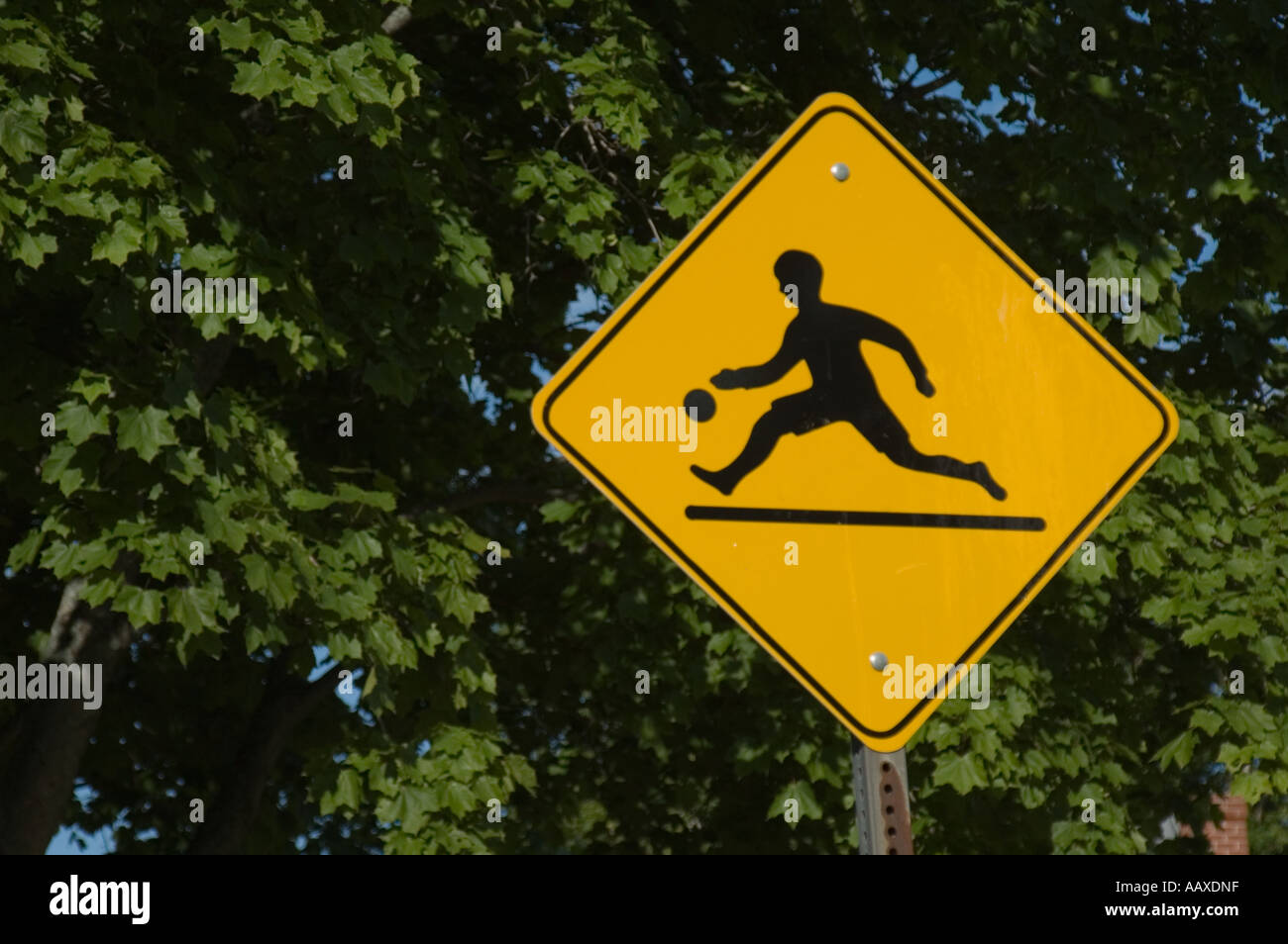 Road sign warning of children playing Stock Photo - Alamy