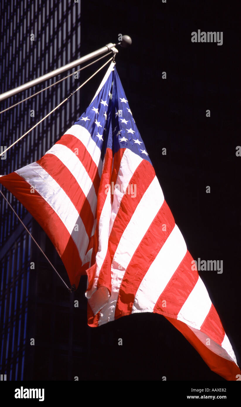 US American flag against business office urban background Stock Photo ...