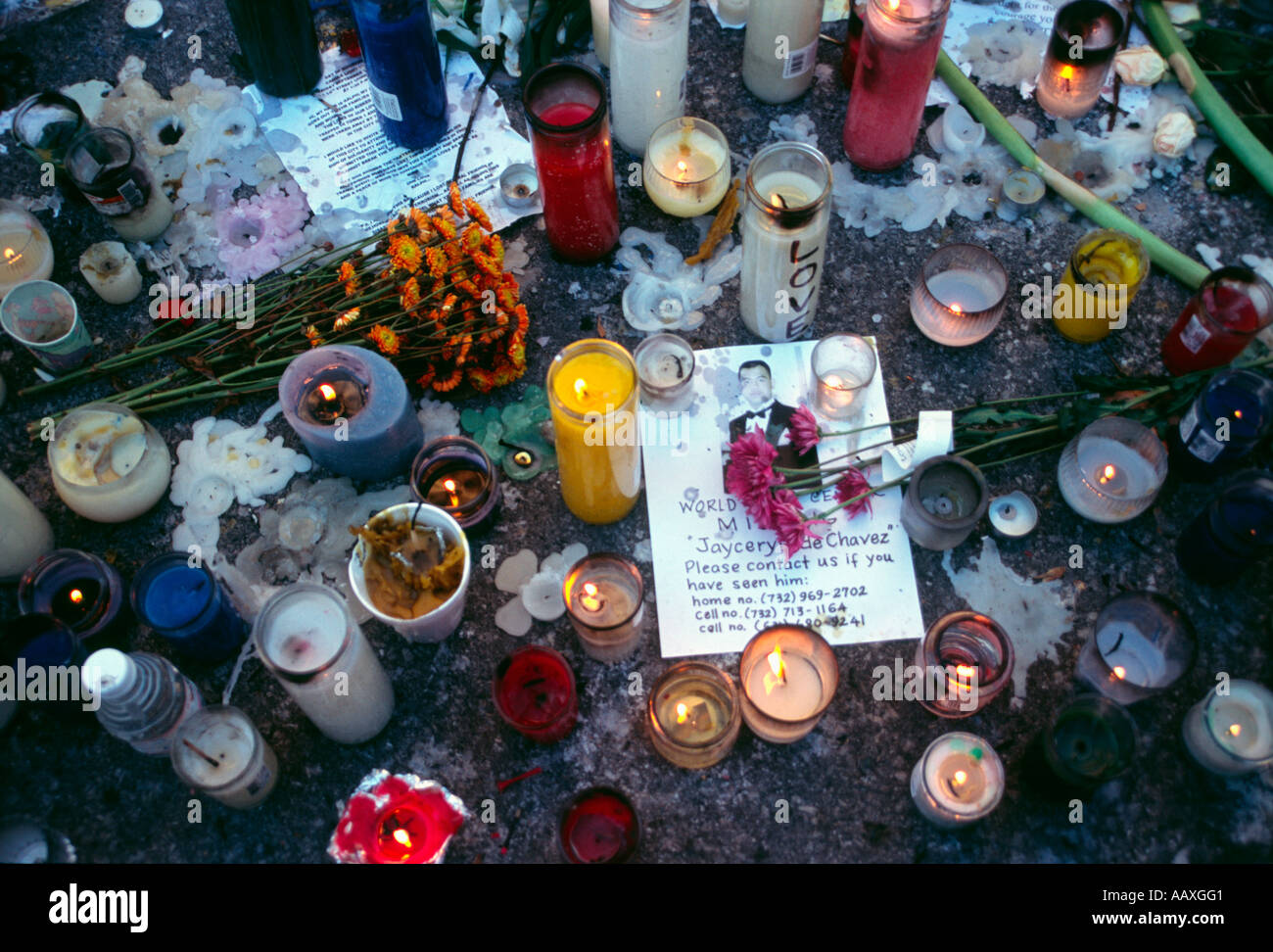 One of numerous memorials around NYC during 9/11. Candles, photos ...