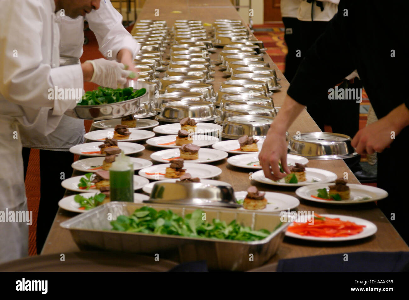 Chefs Preparing Entre for Service Stock Photo - Alamy