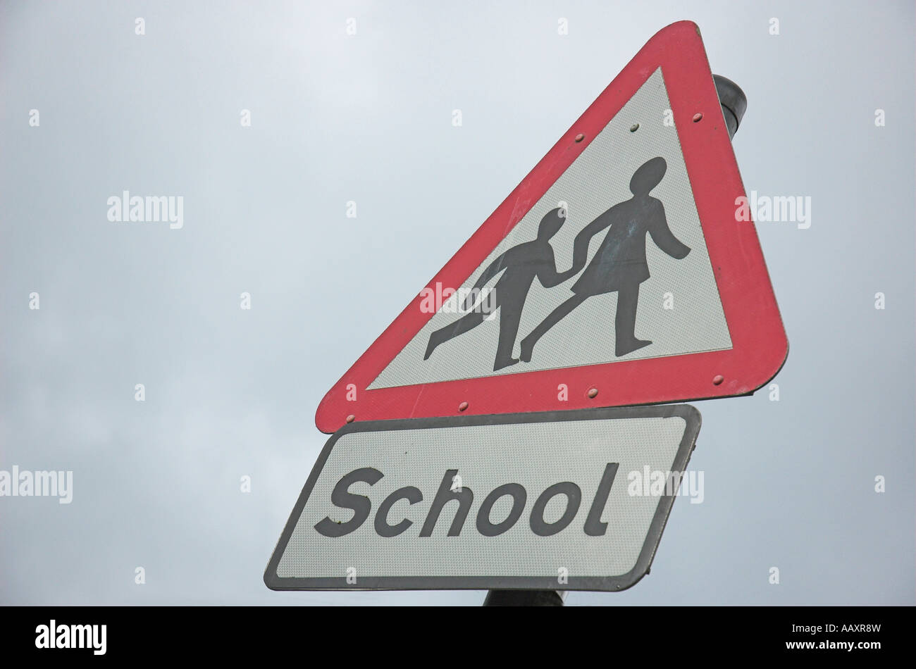 Sign warning motorists of school children in vicinity Stock Photo - Alamy