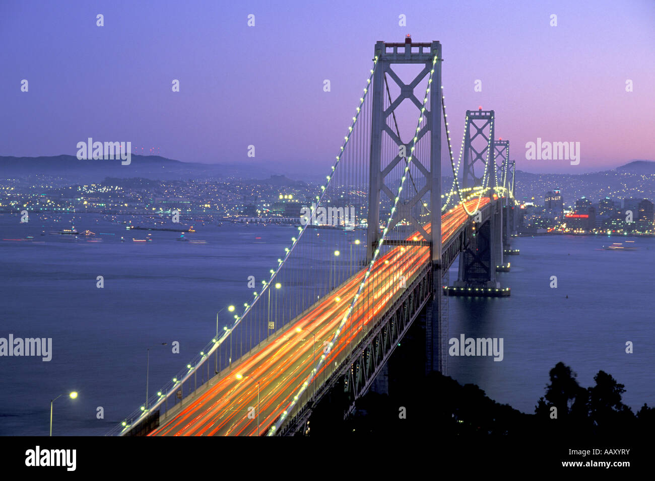 San Francisco Bay Bridge seen from Yerba Buena Island at sunset with ...