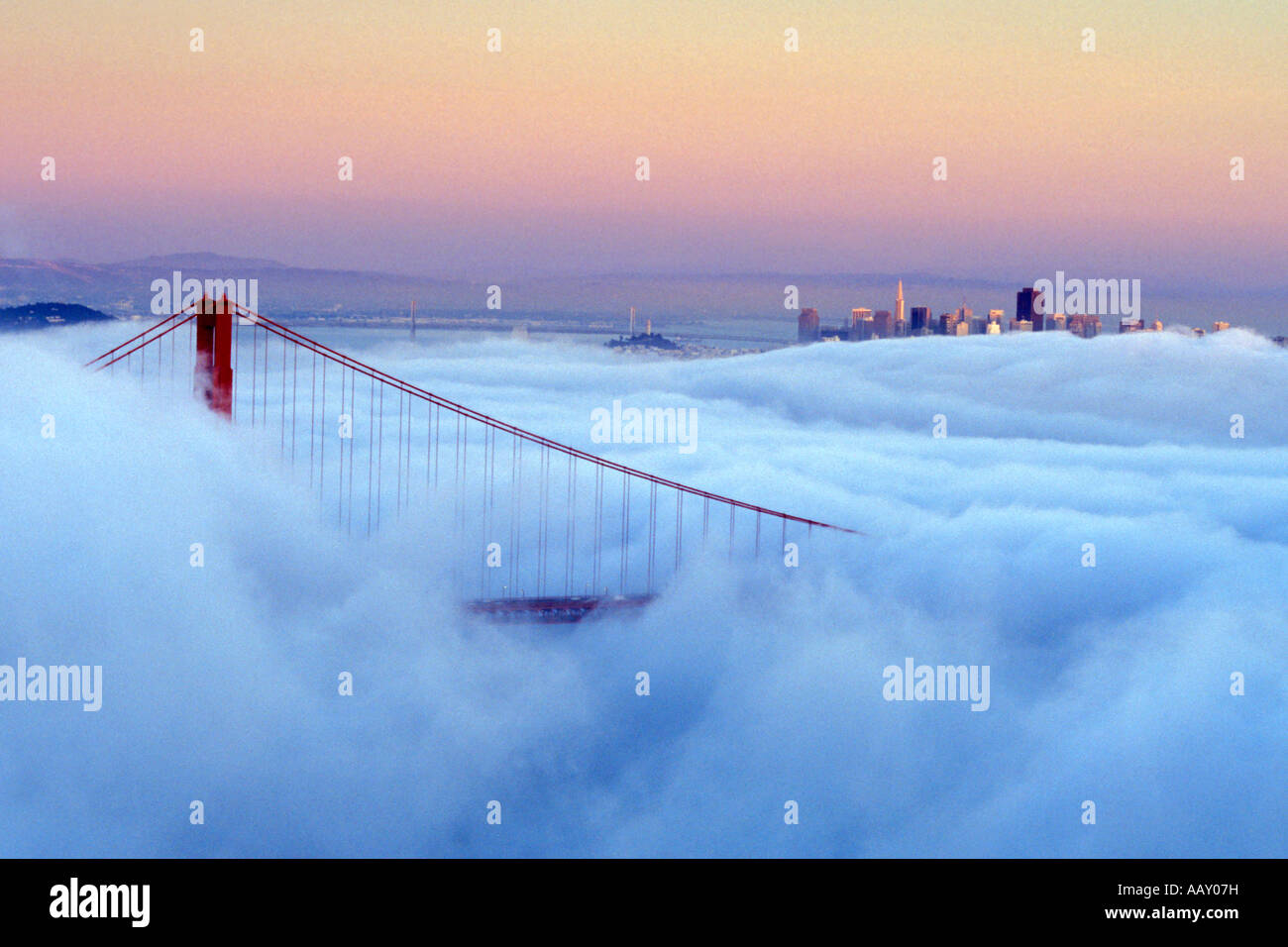 Fog covering the Golden Gate Bridge San Francisco California during ...