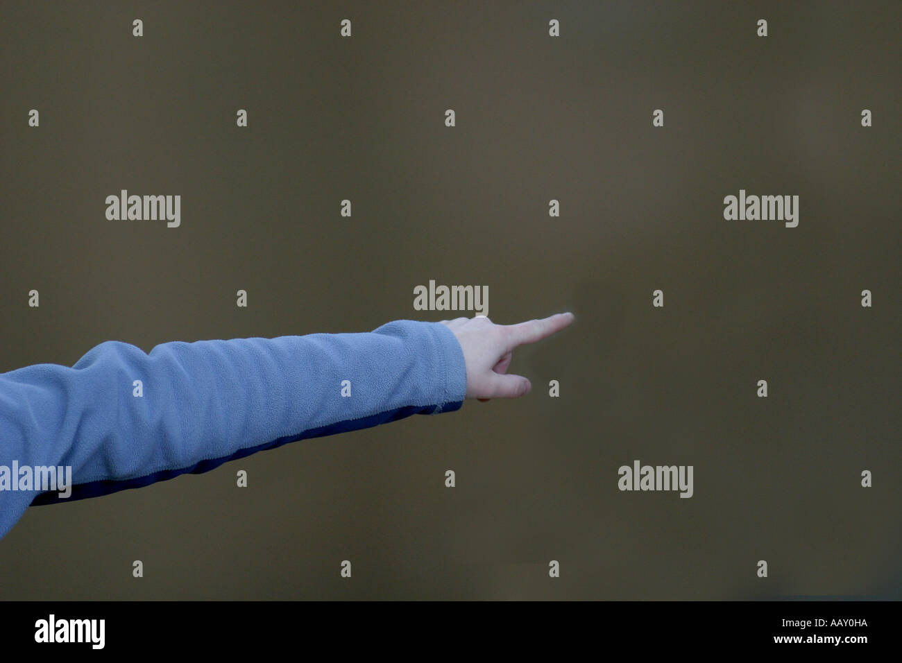 Finger pointing and giving direction, “He went that-a-way” Stock Photo ...