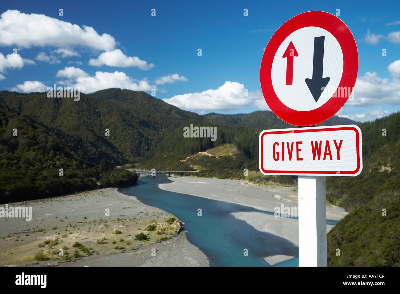Motu river gorge and bridge east cape with give way sign on narrow road ...