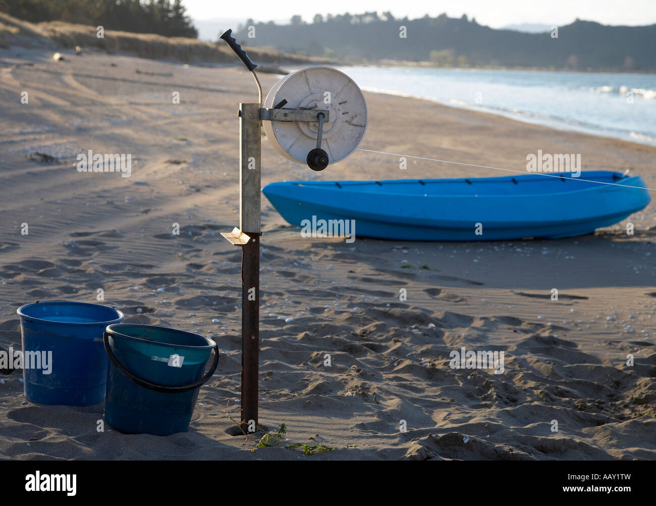 kayak and longline setup on beach Stock Photo - Alamy