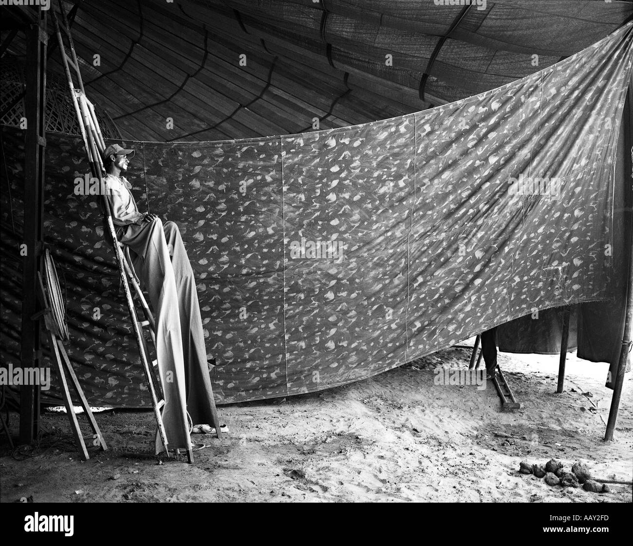 Stilt walker preparing himself back stage The Apollo circus artists ...
