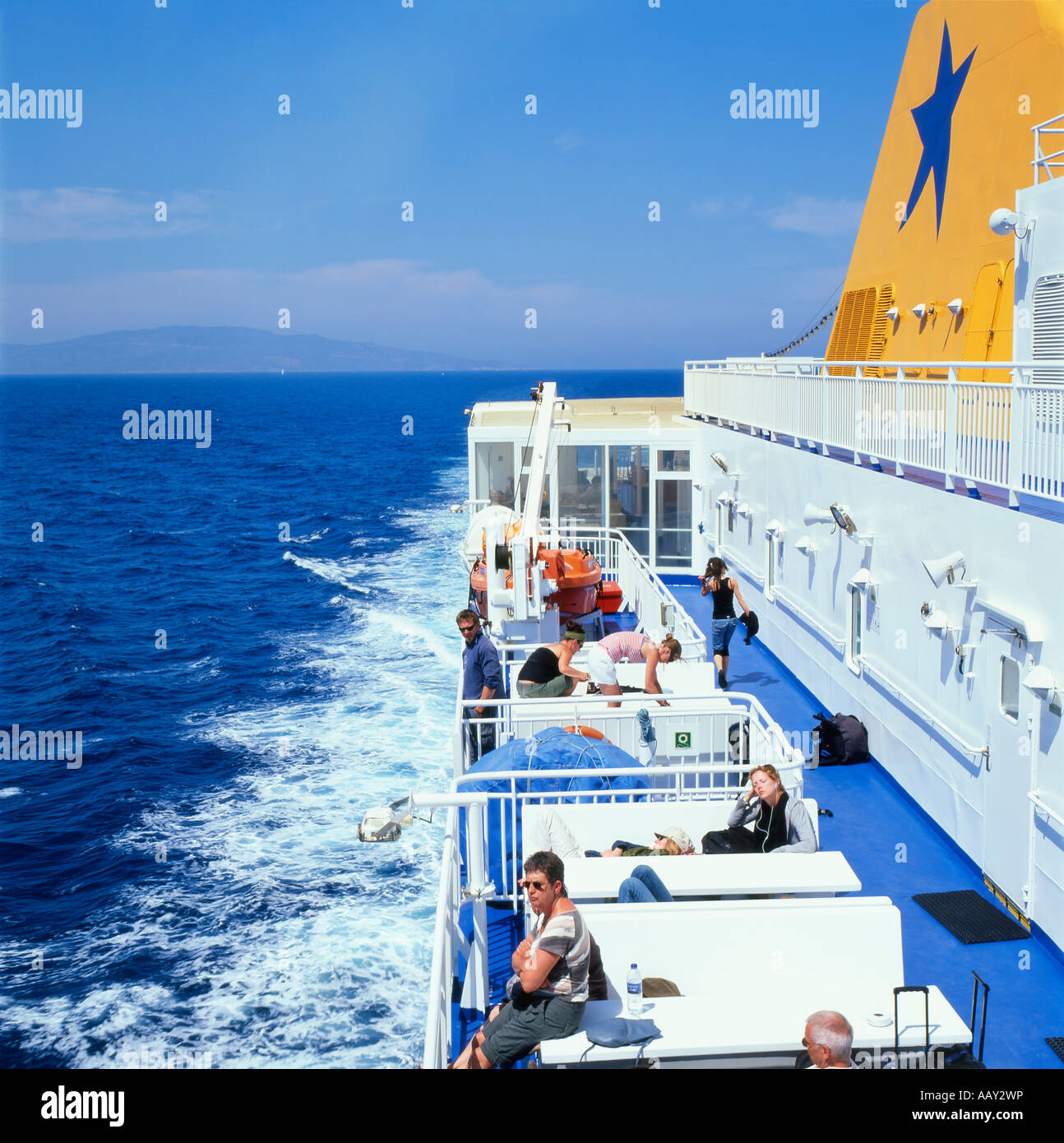 Passengers relaxing on the Blue Star Naxos Greek Island ferry, Aegean ...