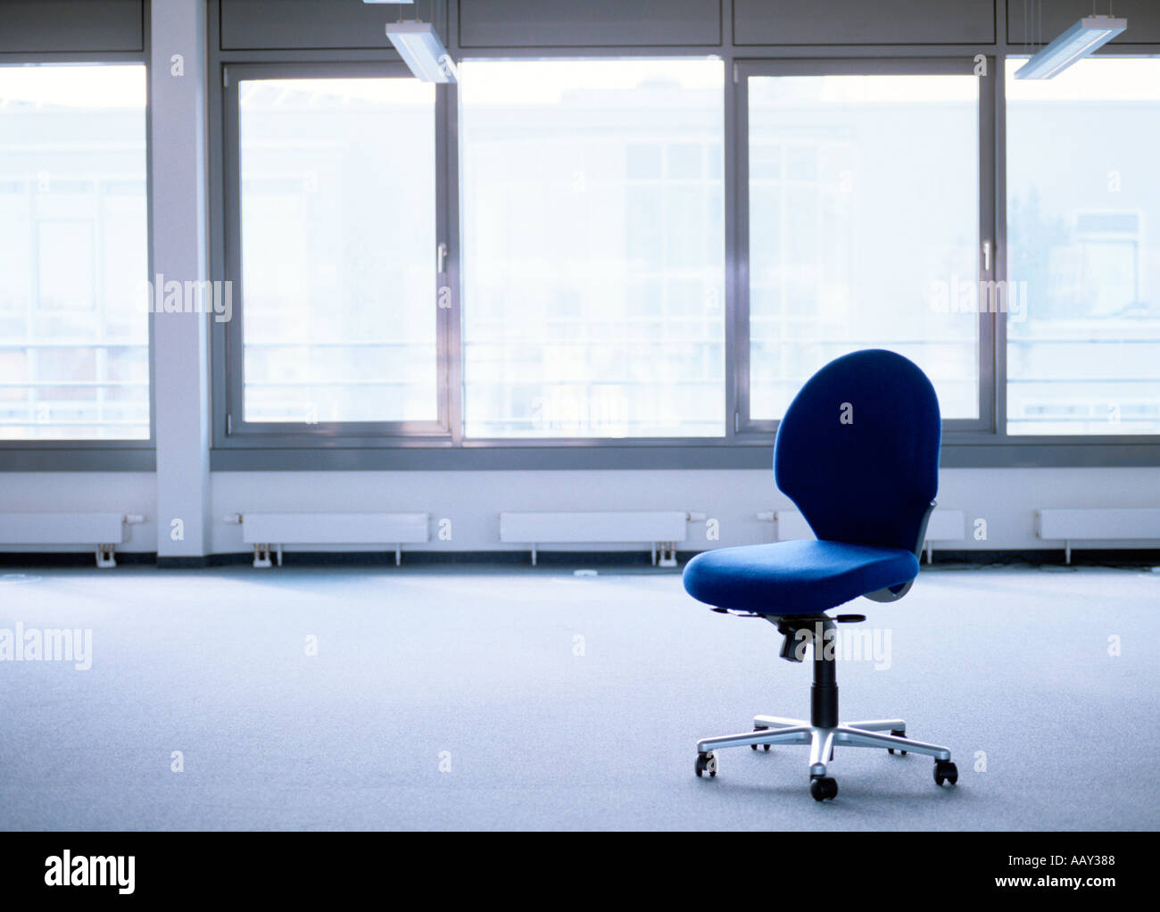 empty office chair in deserted office space Stock Photo - Alamy