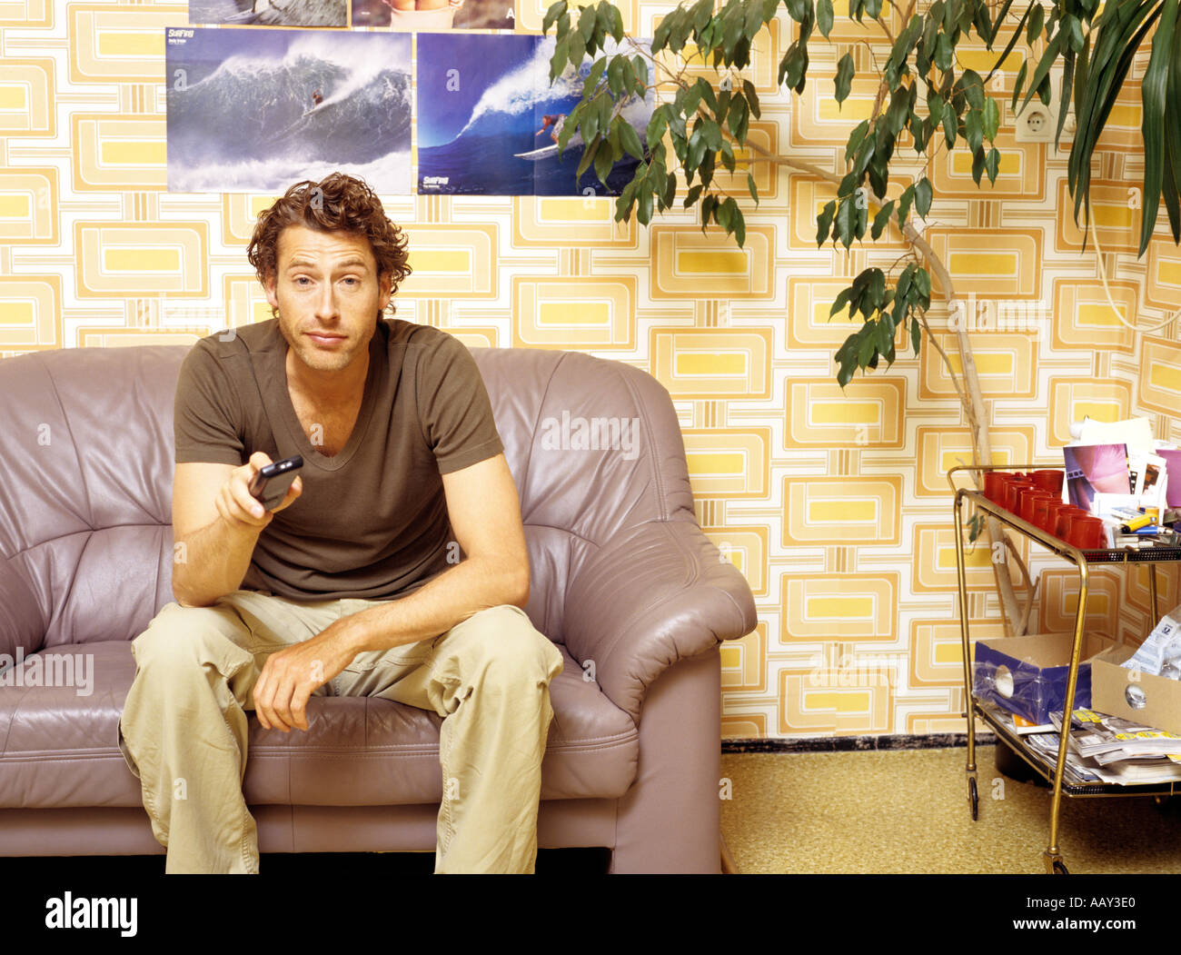 Slob man sofa hi-res stock photography and images - Alamy