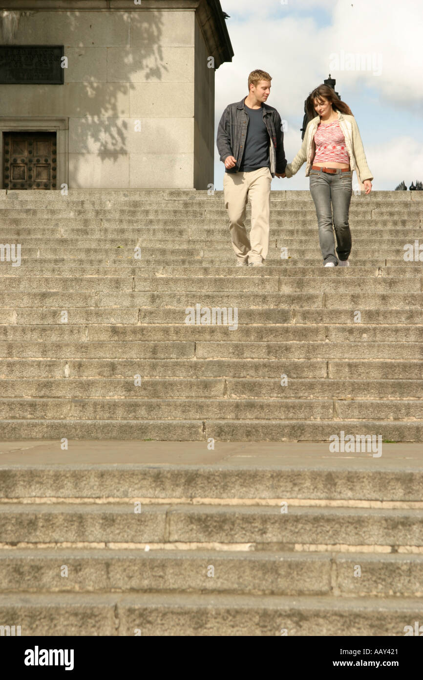Holding hands walking up stairs hi-res stock photography and images - Alamy