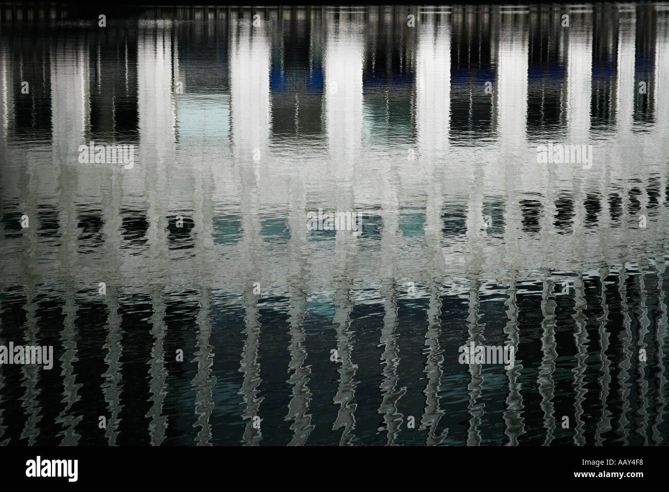Reflections in water of Canary Wharf Buildings Docklands London Stock ...