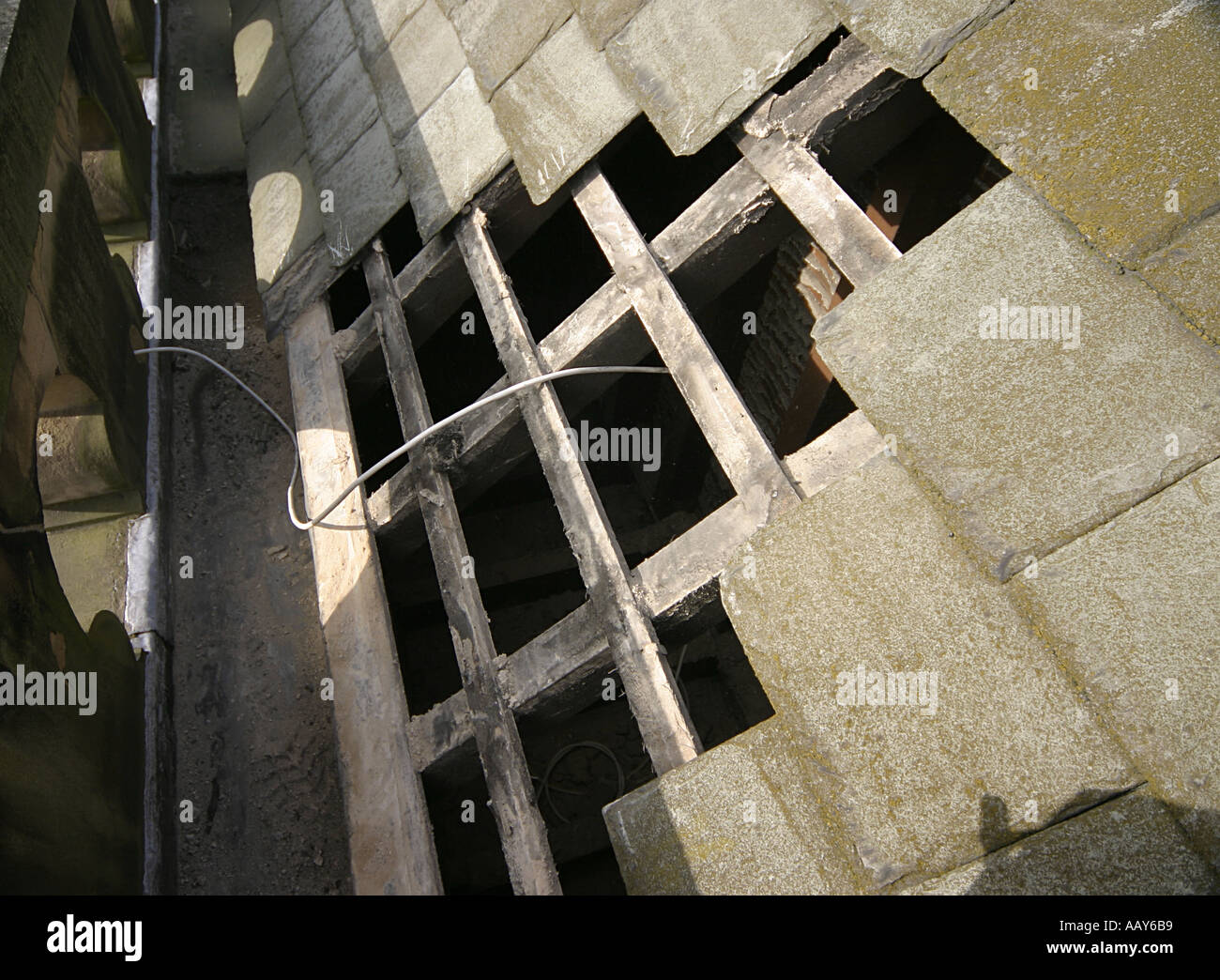 Hole in a roof Stock Photo - Alamy