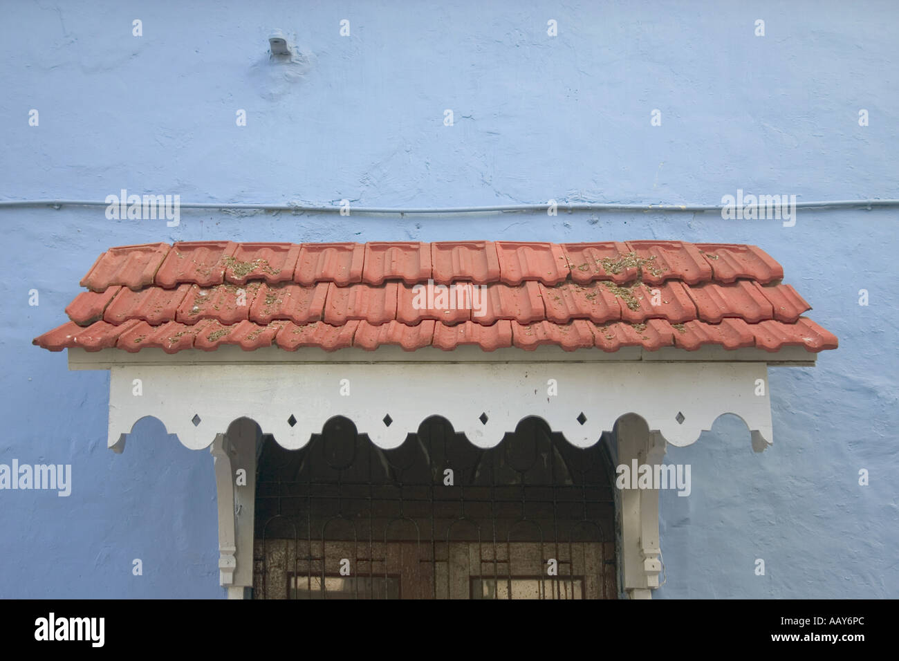 RSC78666 Window blue wall red titles Goan Architecture Old Portugeese ...