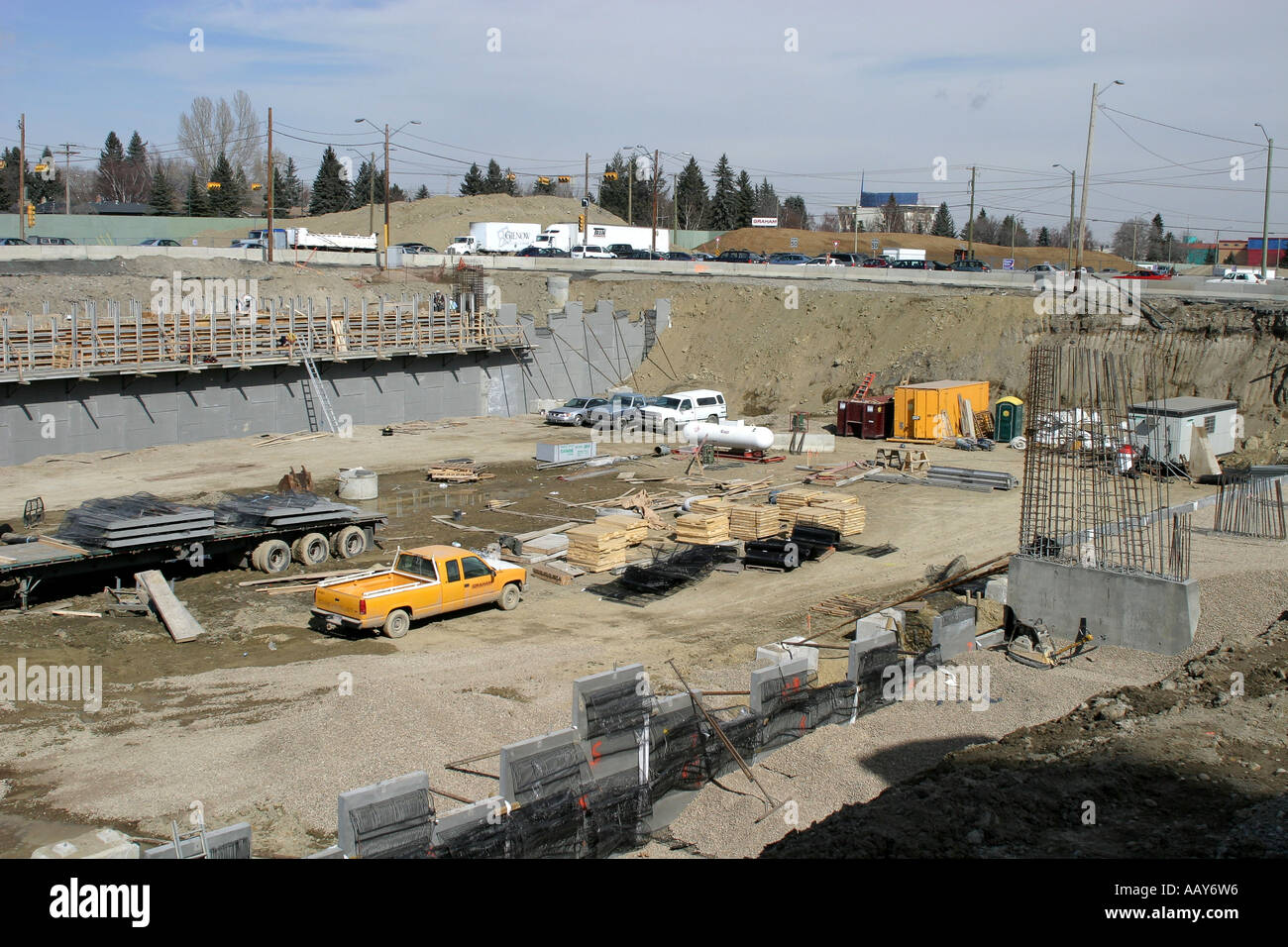 ROAD CONSTRUCTION; Construction of an overpass at a busy intersection ...