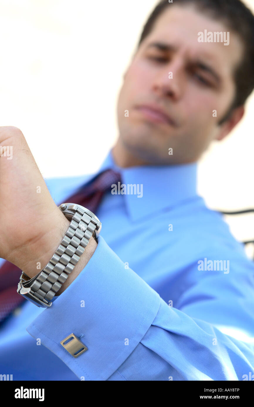 Businessmen checking the time hi-res stock photography and images - Alamy