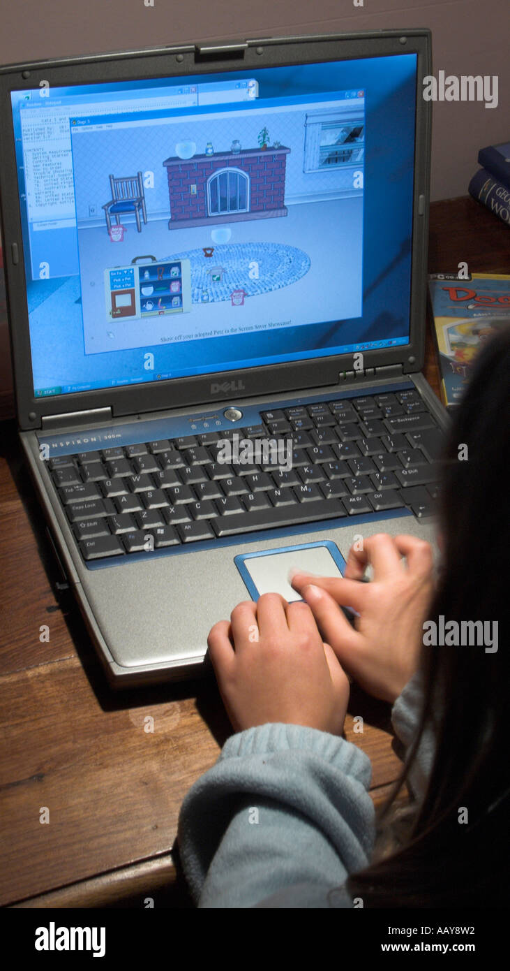 girl child working with laptop computer Stock Photo - Alamy