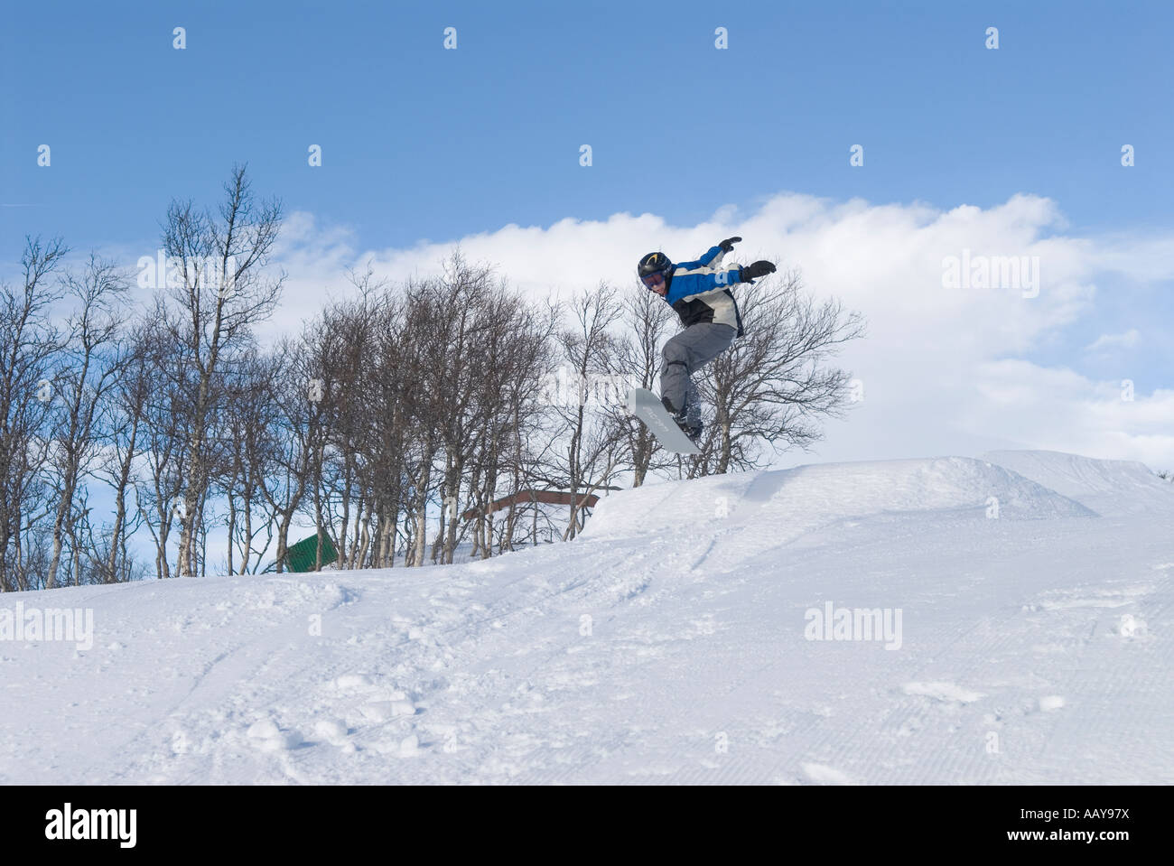 Boy on snowboard Stock Photo - Alamy