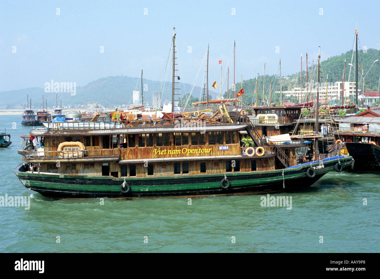 Wooden tourist cruise boat in the harbour, Bai Chay port, Halong Bay ...