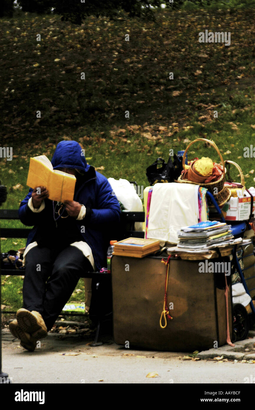 Homeless Man Reading Central Park New York City Stock Photo - Alamy