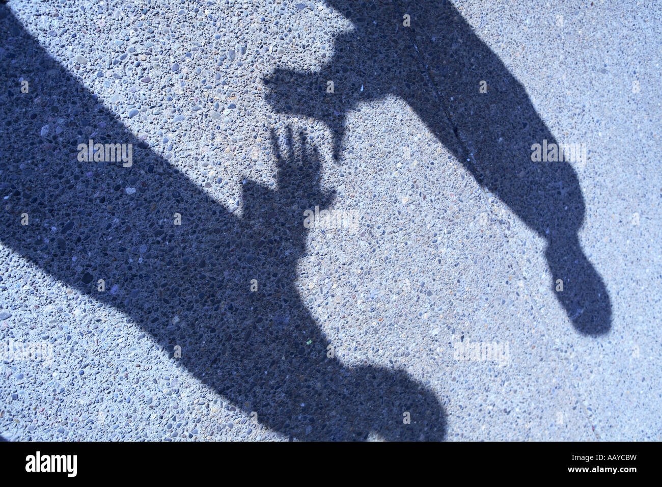 Shadow of businesspeople handshake Stock Photo - Alamy