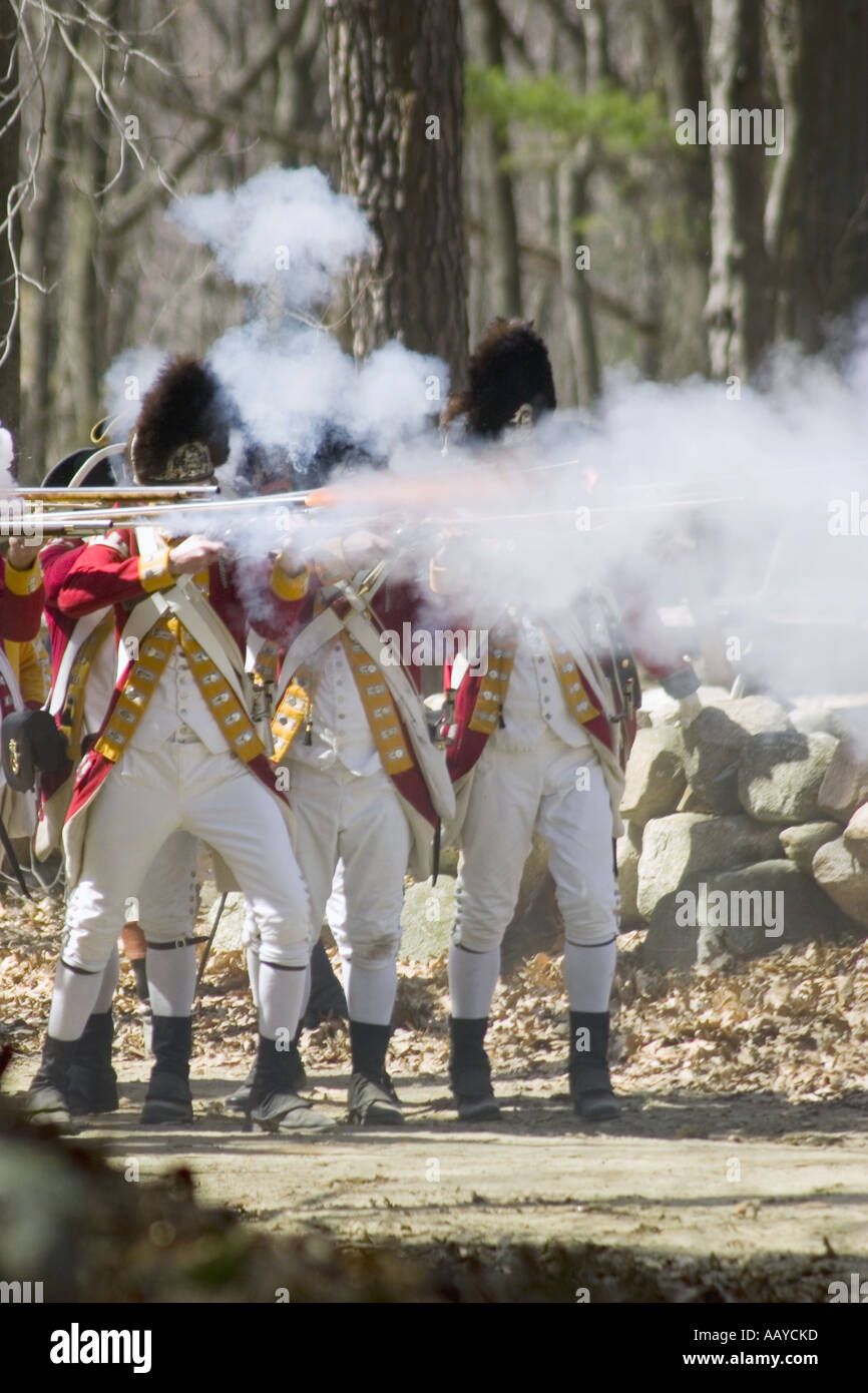 British regulars fire weapons during battle reenactment Stock Photo - Alamy