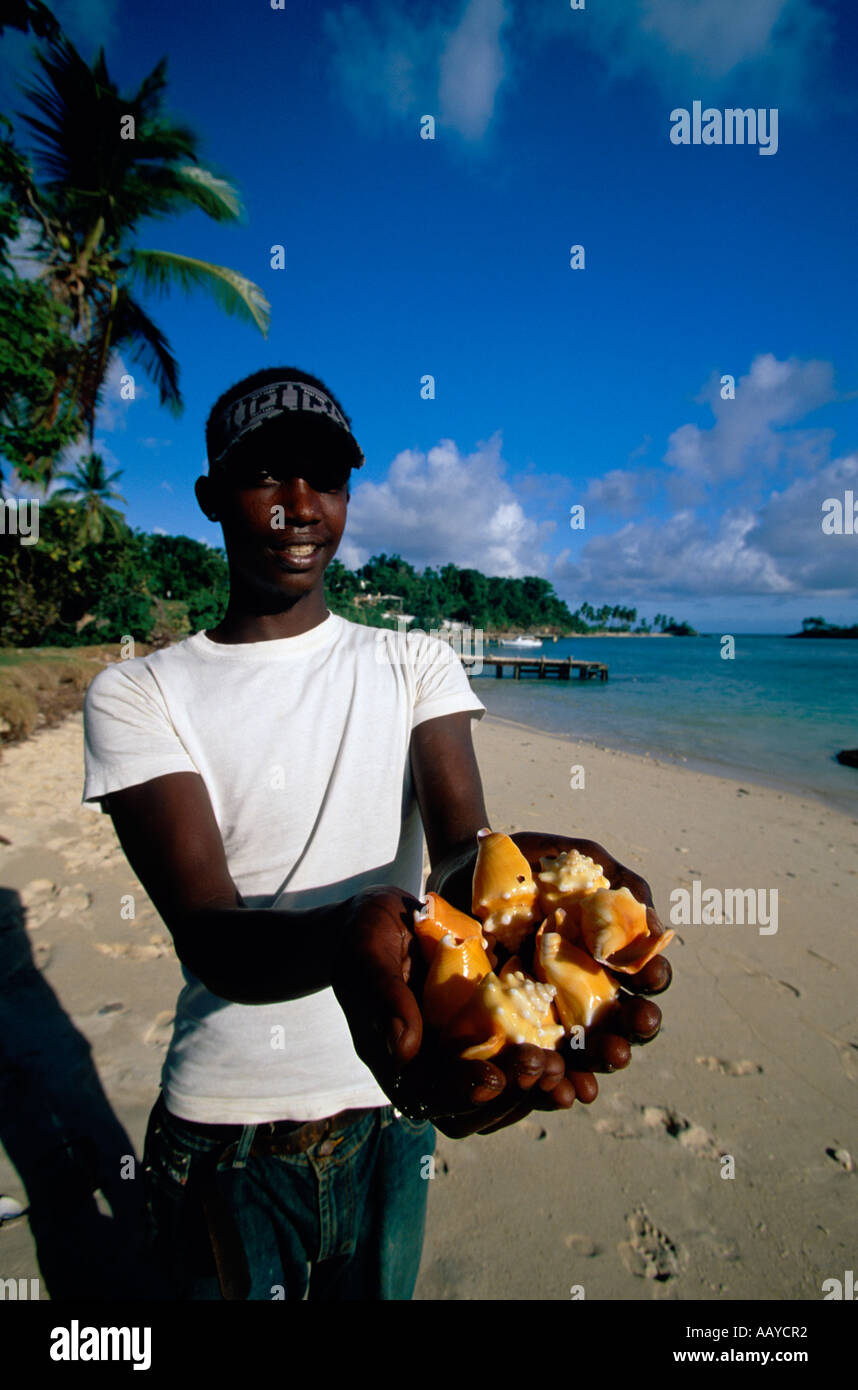 Man offers shells at Cayo Levantado Bahia de Samana Dominican Republic ...