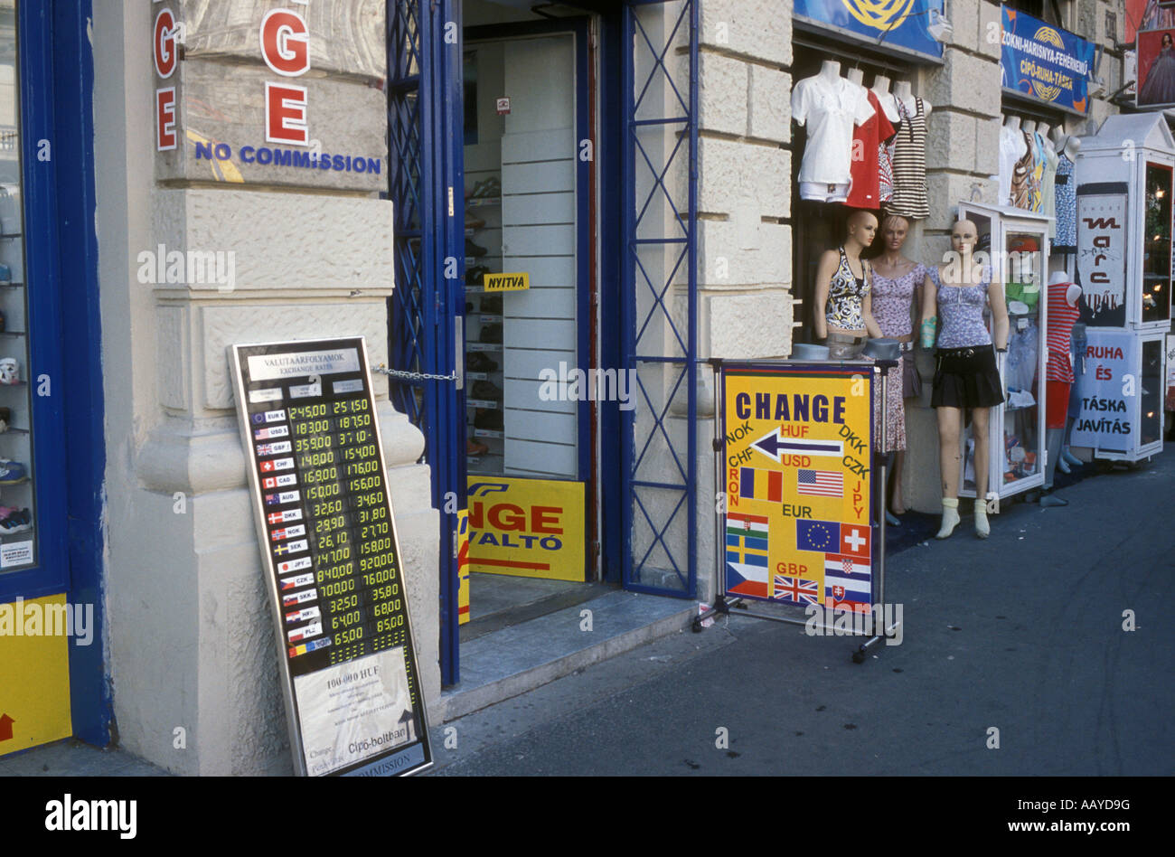 Two signs outside a money exchange business; an advertising and an ...
