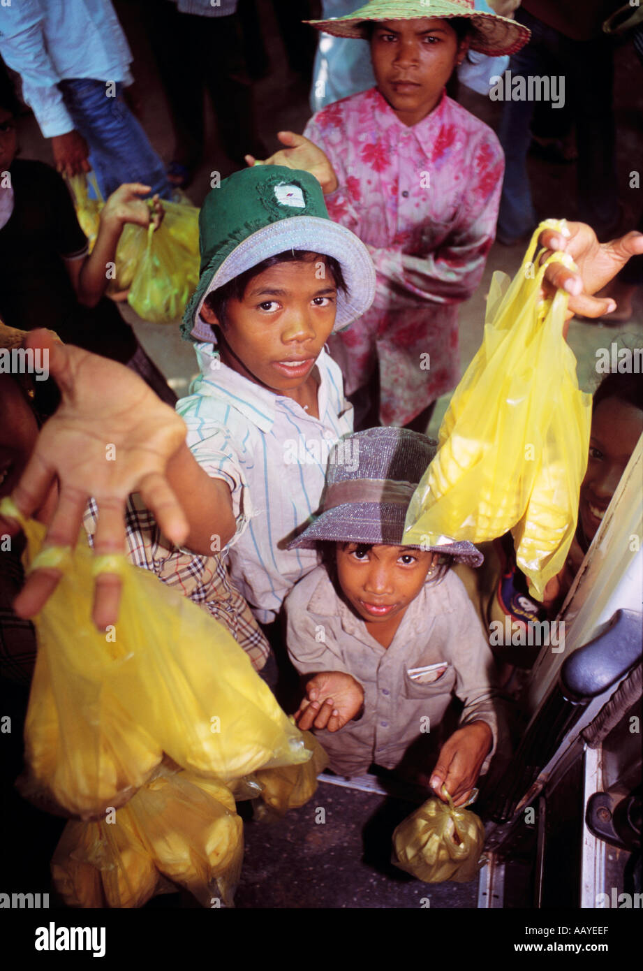 Girl selling hats hi-res stock photography and images - Alamy