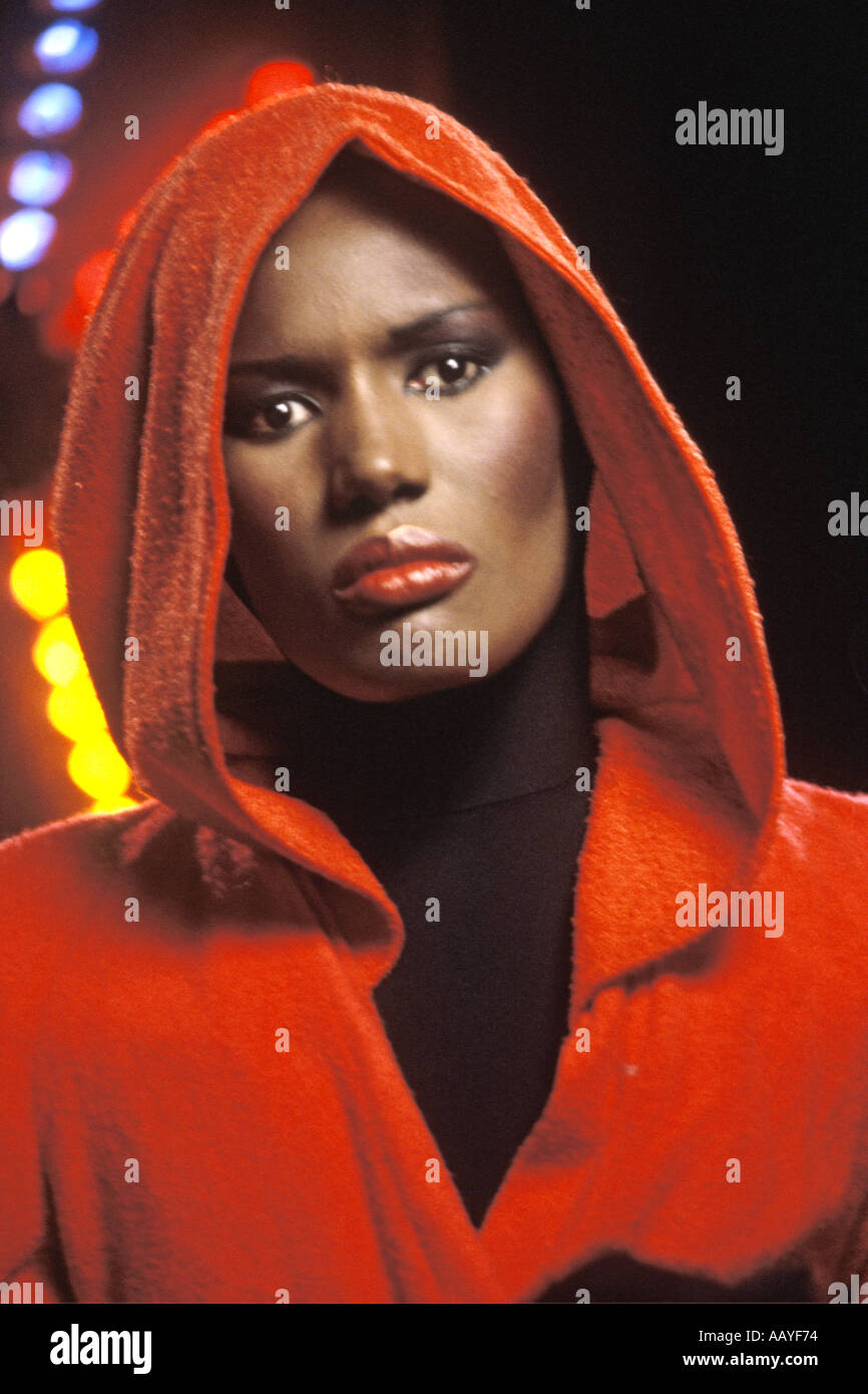 Grace Jones singer full face with red costume and hood PER0036 Stock ...