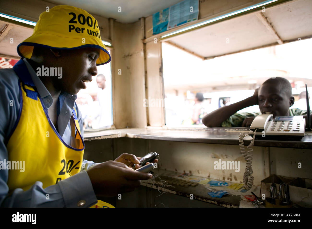 TBC shop owner an operator of MTN mobile payphone above the taxi park ...