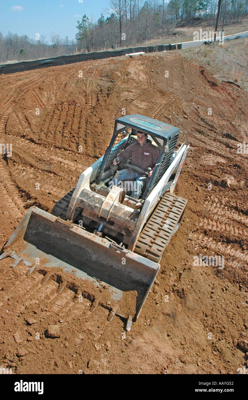 Clearing lots for new house construction tree removing with bobcat ...