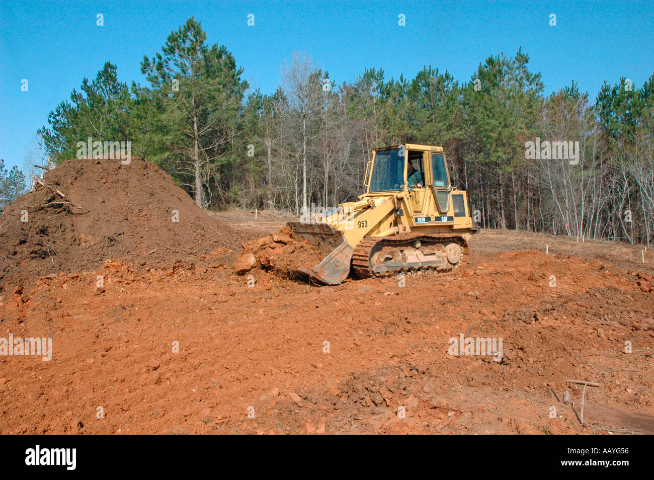Clearing lots for new house construction tree removing with bobcat ...