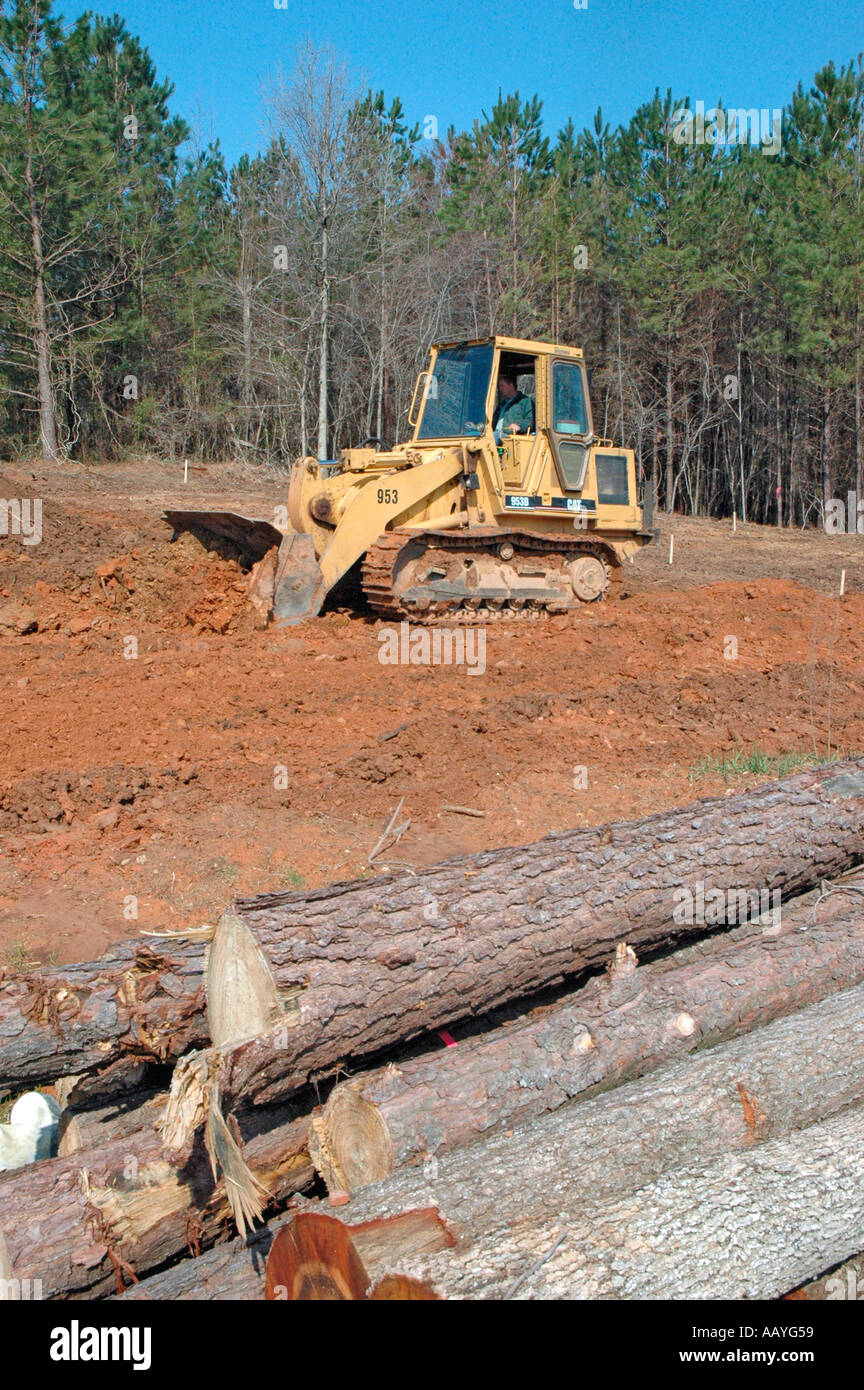 Clearing lots for new house construction tree removing with bobcat ...