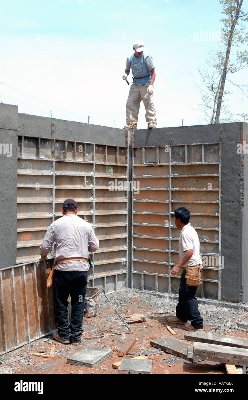 Taking down steel re usable house construction foundation forms by ...