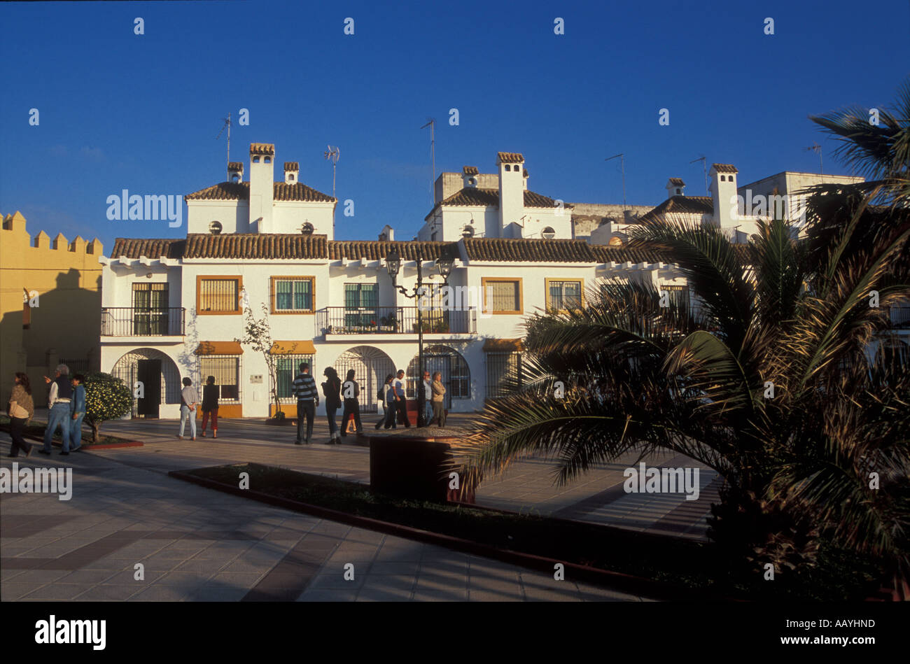 People walking across a Plaza, Chipiona, Spain, 2006 Stock Photo - Alamy