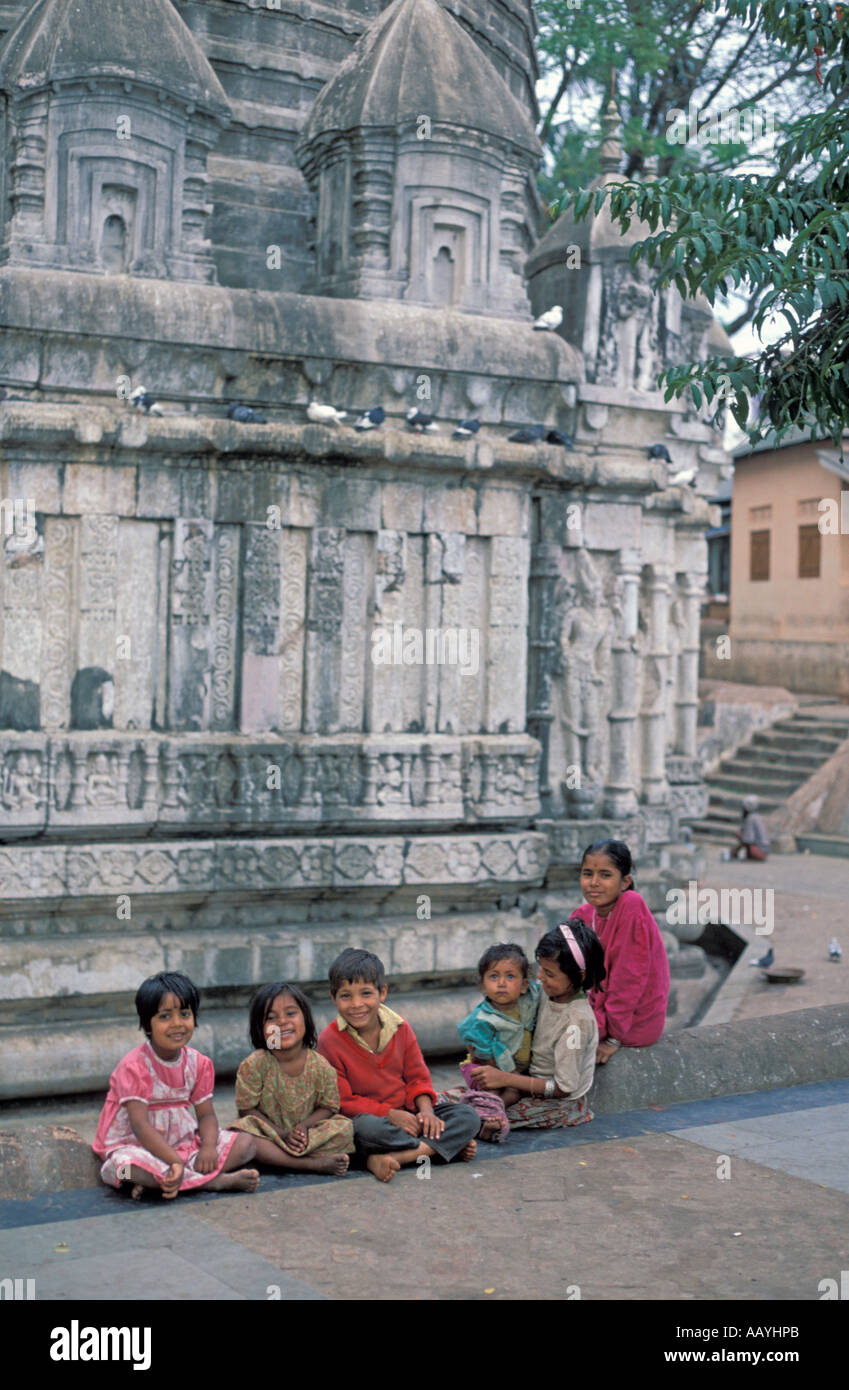 Local children sat by a temple, Guwahti Assam Stock Photo - Alamy