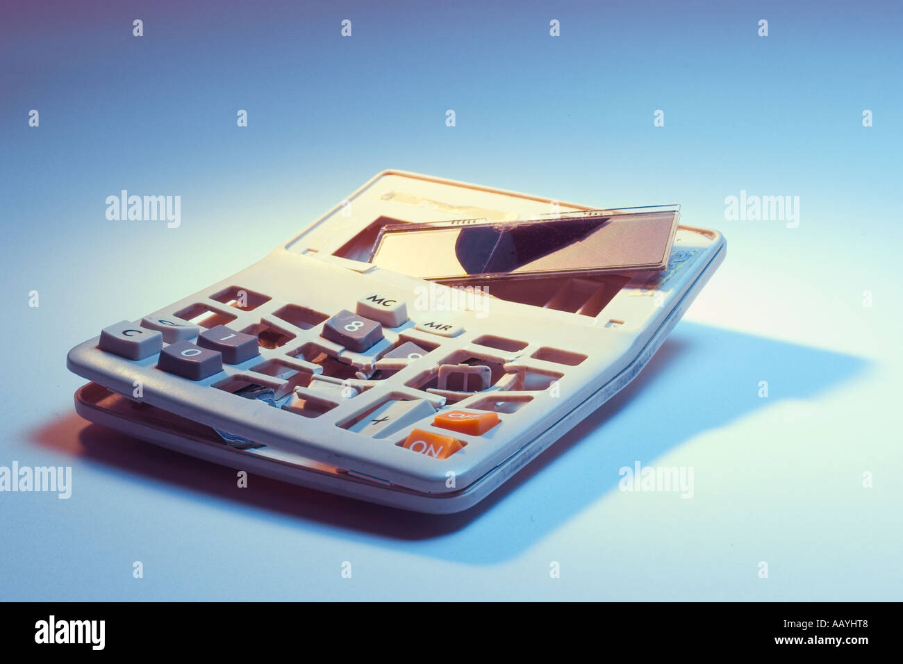 Smashed calculator hi-res stock photography and images - Alamy