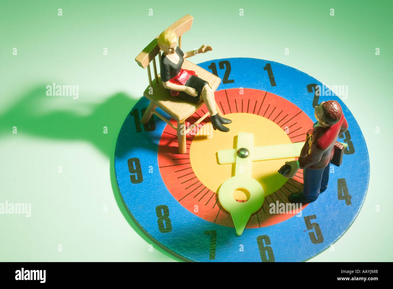 Business People Figures and Clock Stock Photo - Alamy
