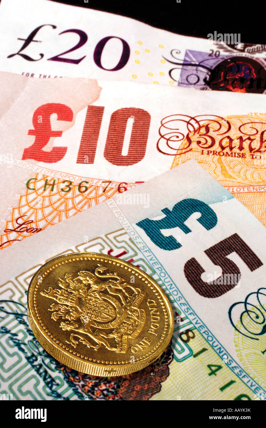 UK Pound Sterling banknote currency and one Pound coin Stock Photo - Alamy