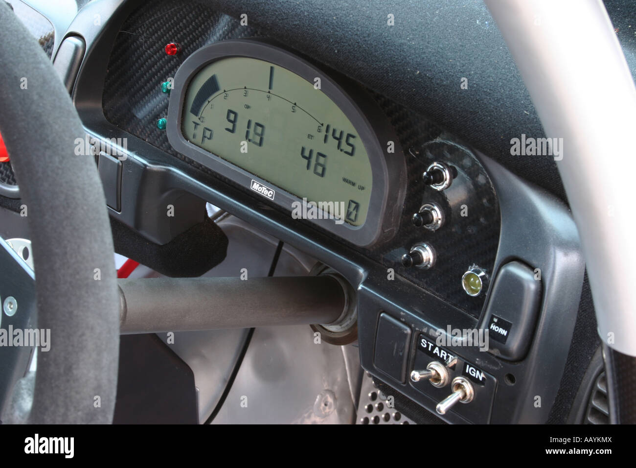 dash and facia area in a modified performance race car showing main ...