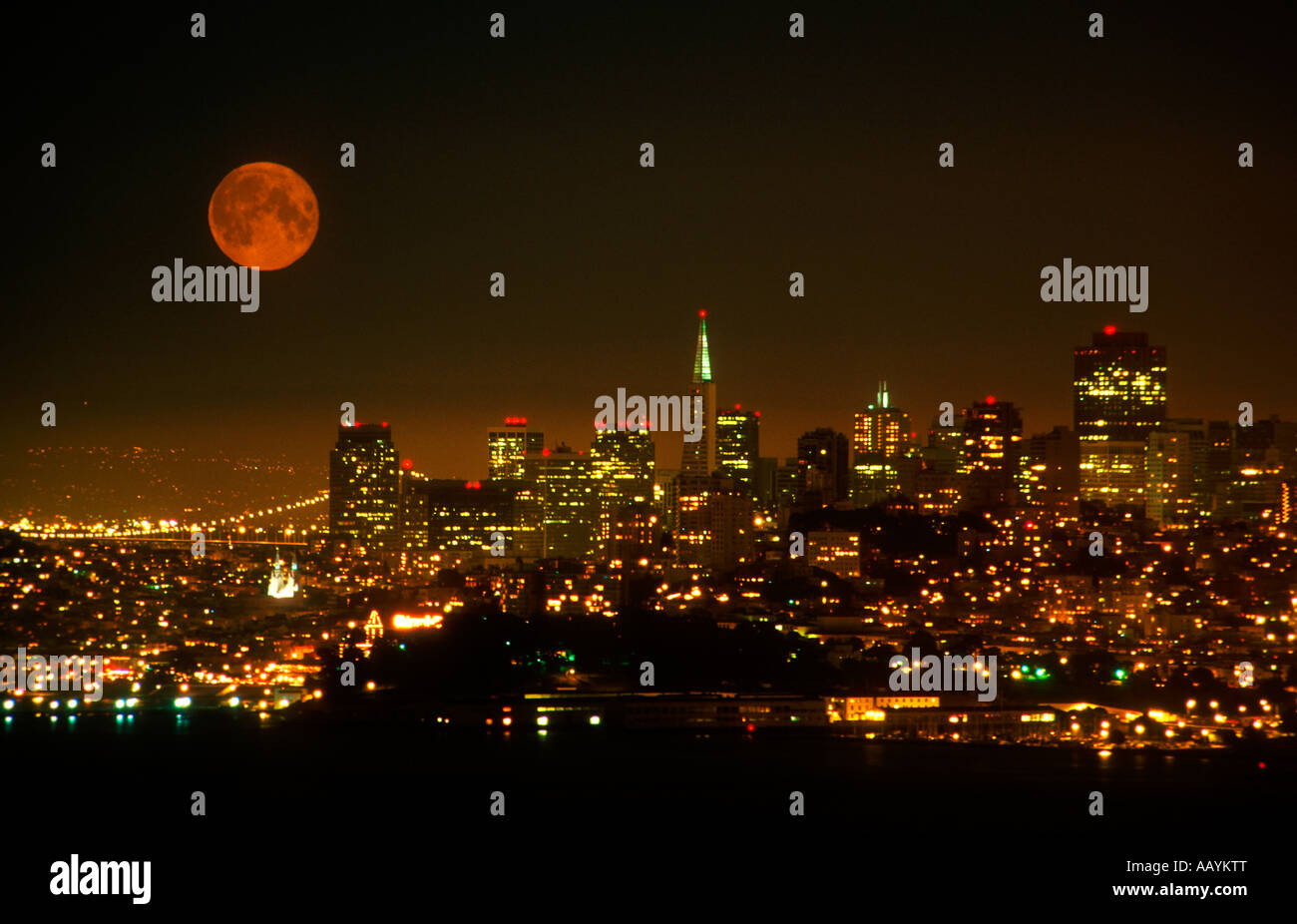 Full moon rises over a San Francisco cityscape Stock Photo - Alamy