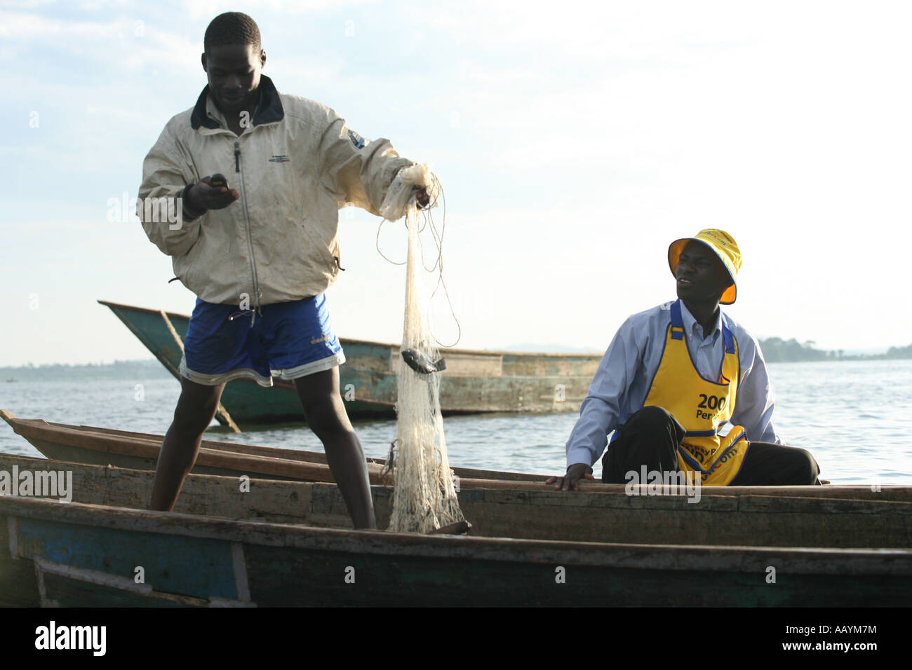 Black man cell phone fishing hi-res stock photography and images - Alamy
