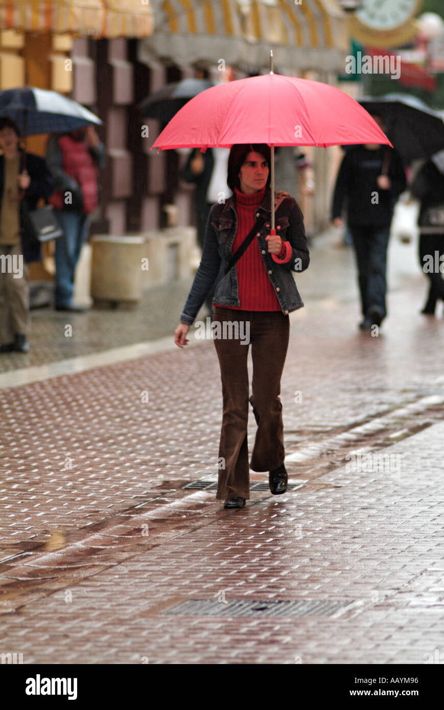 Woman in a busy street hi-res stock photography and images - Alamy