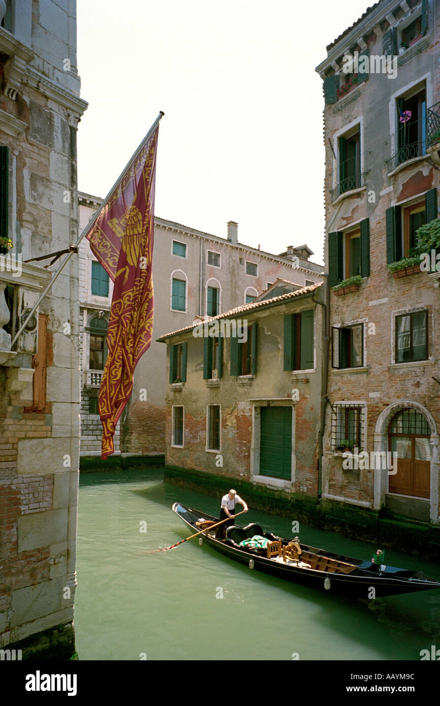 A typical scene in Venice with boats canals and ancient buildings Stock ...