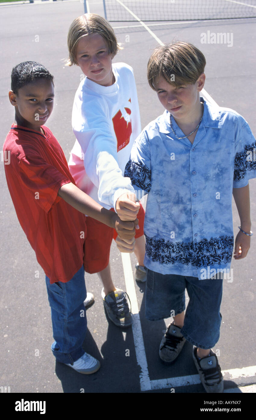 3 Teenage boys friends determined Stock Photo - Alamy