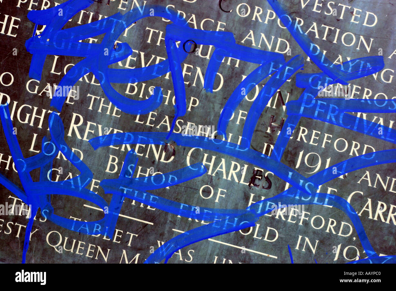 Graffiti on memorial Plaque in park in Hereford England UK Stock Photo ...